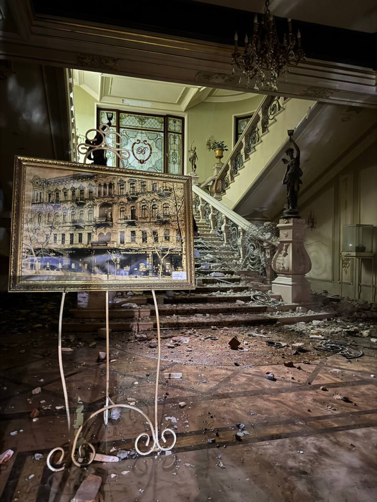 The entire street is strewn with debris, an architectural monument and ...